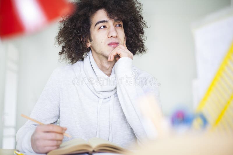Studying and Thinking Young Man Stock Photo - Image of pensive, pencil ...