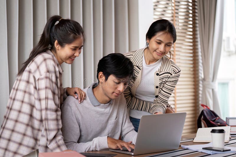 Studying Together and Exploring Ideas. Three Friends Discussing and ...