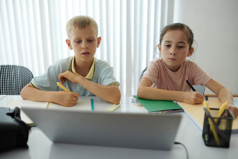 Studying and Working on School Assignments Together Stock Image - Image ...