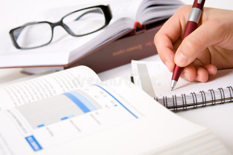 Studying and writing notes stock photo. Image of book - 13593956