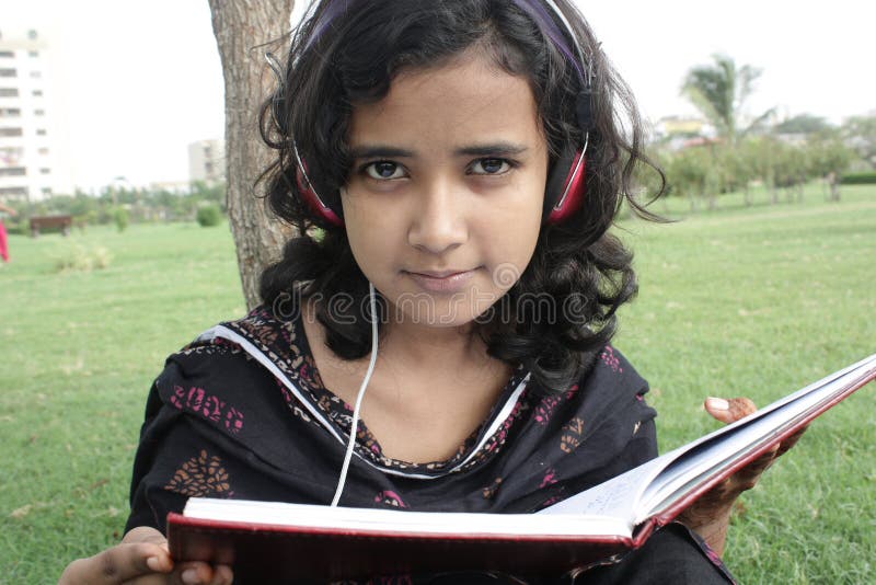 Pakistani Student Holding Book Stock Photos - Free & Royalty-Free Stock ...