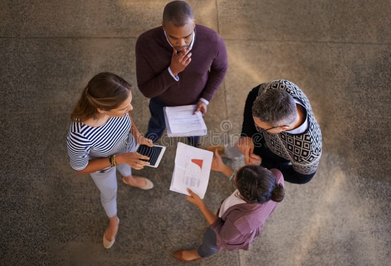 Stuff Happens when we Work Together. High Angle Shot of a Group of Work ...