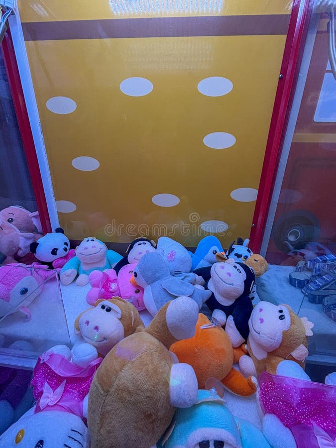 A Stuffed Animal Game with a Bunch of Stuffed Animals in a Cage Stock ...