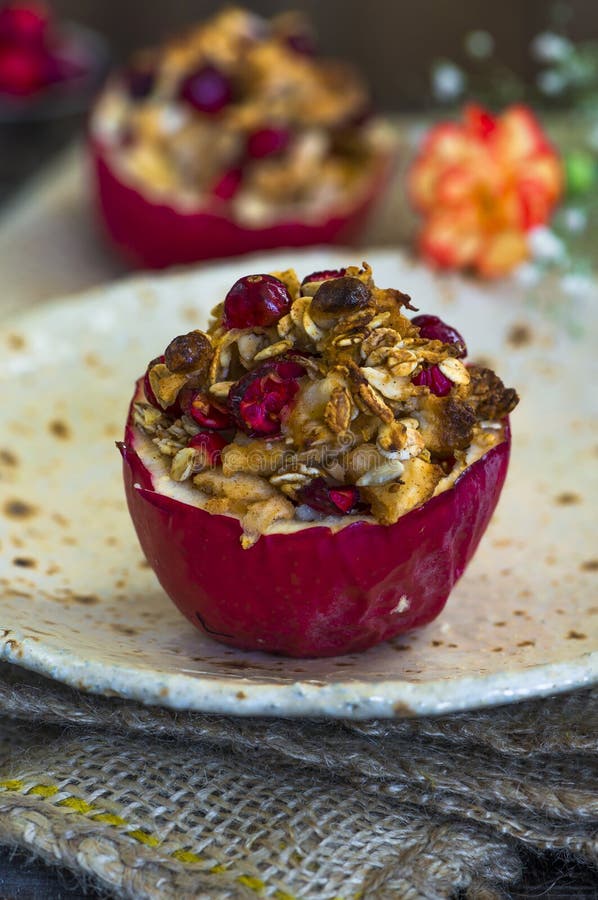 Stuffed Baked Red Apples with Granola, Cranberries and Marzipan Stock ...