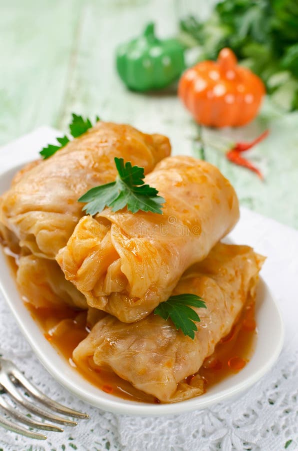 Stuffed Cabbage Rolls with Rice and Meat on a White Plate Stock Photo ...