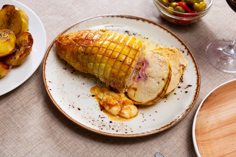 Stuffed Chicken Served with Potatoes on Platter Stock Image - Image of ...