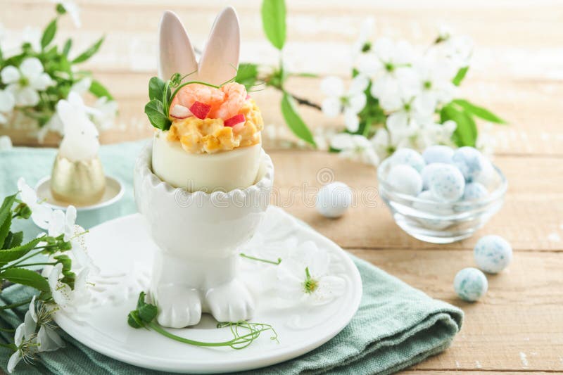 Stuffed or Deviled Eggs with Yolk, Shrimp, Pea Microgreens with Paprika ...