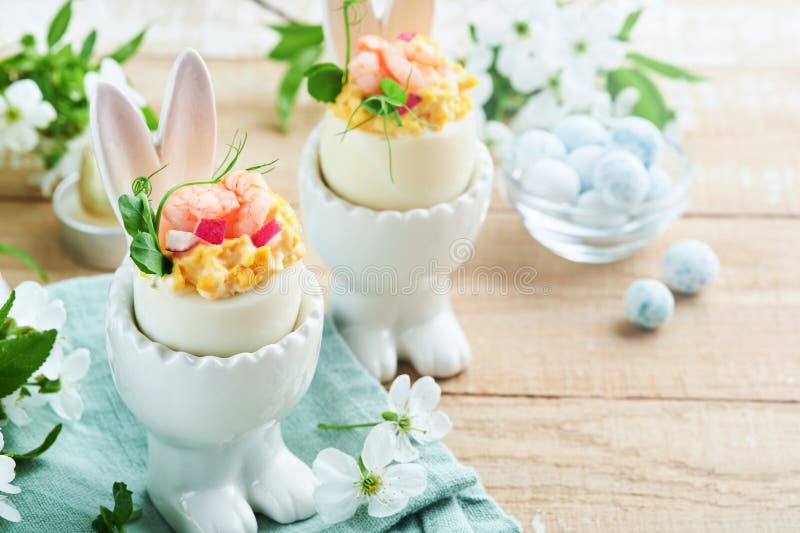 Stuffed or Deviled Eggs Yolk, Shrimp, Pea Microgreens with Paprika for ...