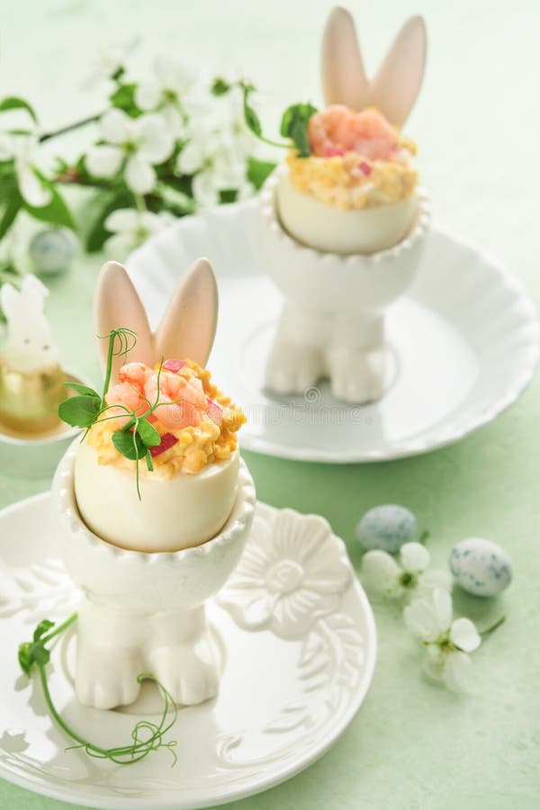 Stuffed or Deviled Eggs with Yolk, Shrimp, Pea Microgreens with Paprika ...