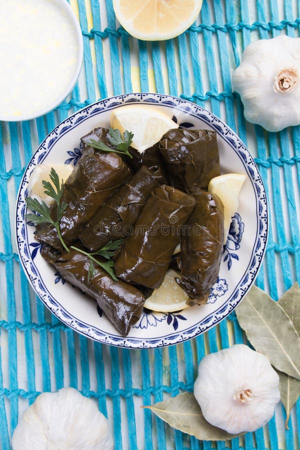 Stuffed grape leaves stock image. Image of cooked, dolmadakia - 138159943