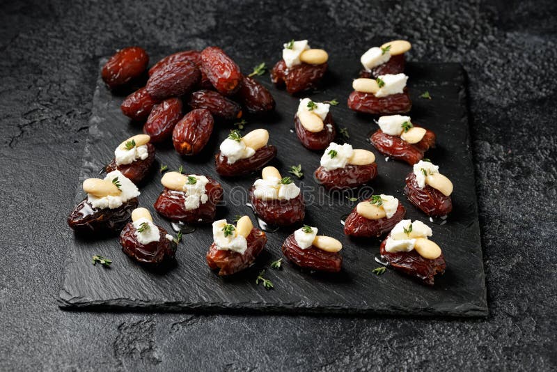 Stuffed Medjool Dates with Goat Cheese, Almonds and Honey Stock Image ...