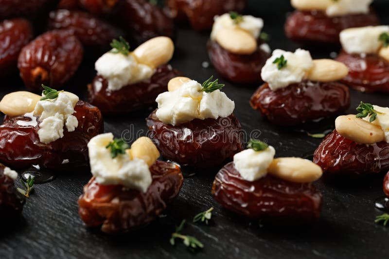 Stuffed Medjool Dates with Goat Cheese, Almonds and Honey Stock Image ...