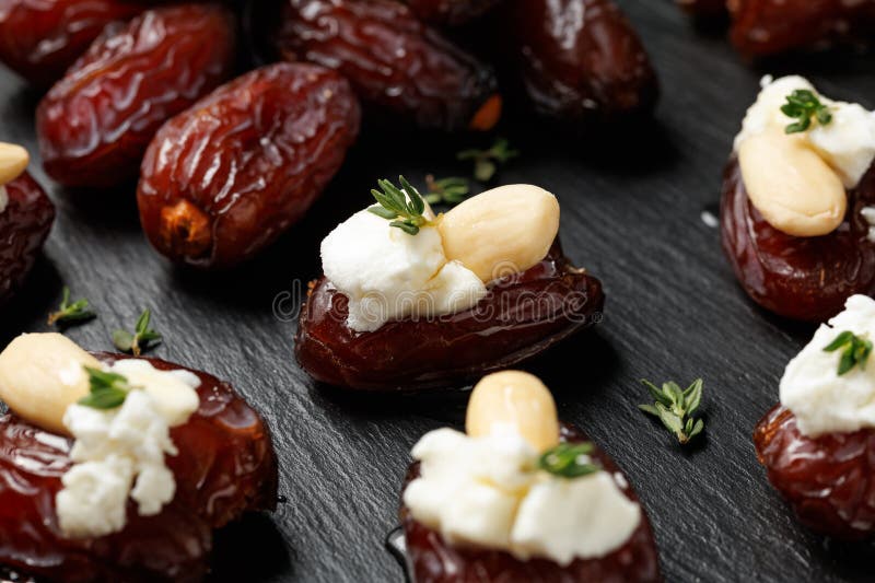 Stuffed Medjool Dates with Goat Cheese, Almonds and Honey Stock Image ...