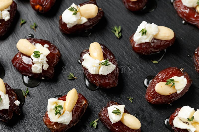 Stuffed Medjool Dates with Goat Cheese, Almonds and Honey Stock Image ...