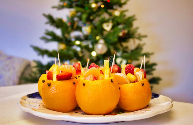 Stuffed Oranges with Fruit Salad on a Christmas Table Stock Photo ...