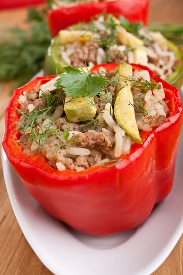 Stuffed peppers on a plate stock photo. Image of food - 10786396