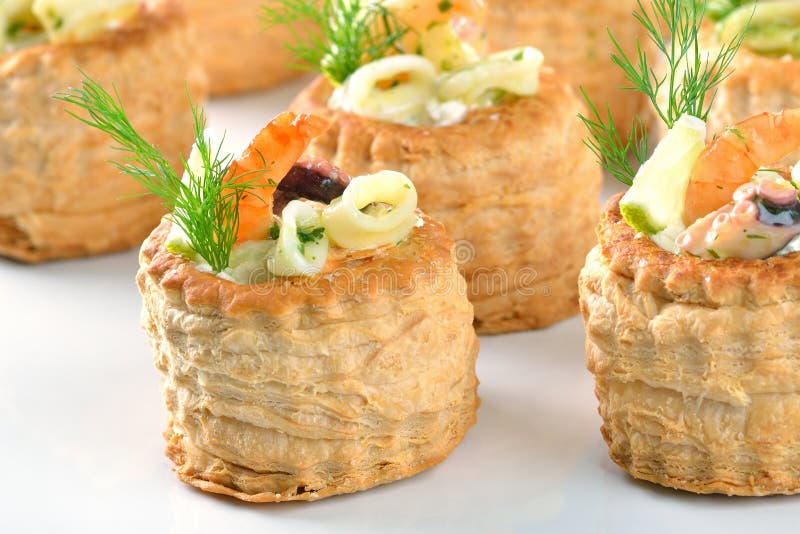 Stuffed puff pastry shells stock image. Image of finger - 22409133