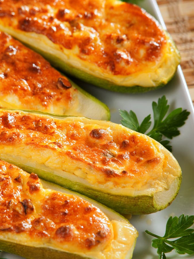 Zucchini with Egg and Cheese Stock Photo - Image of table, fork: 74907406