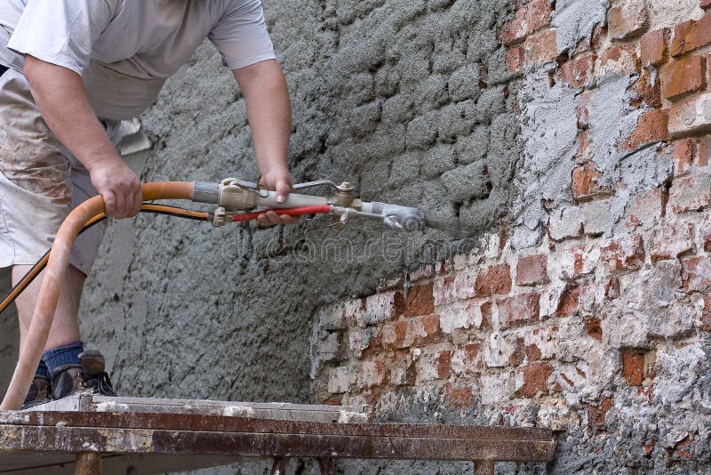 Stukadoor stock foto. Image of bouw, machine, pleisterwerk - 26233396