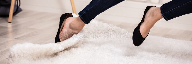 Stumble in a Carpet stock photo. Image of hazard, floor - 246315066