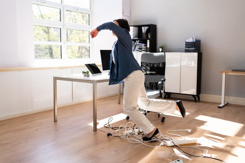 Stumble and Fall Over Wire stock photo. Image of workplace - 246788792