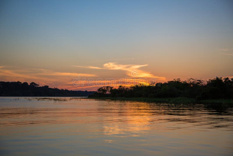 Beautiful Colorful Sunset Over the Amazon River with Silhouette of ...