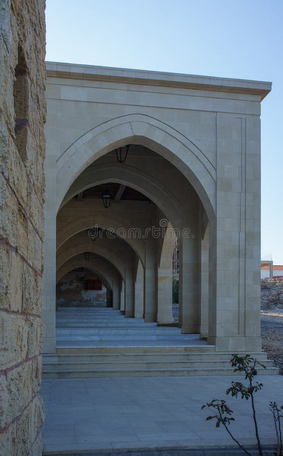 Stunning Architecture of Historic Arches in a Serene Courtyard at ...