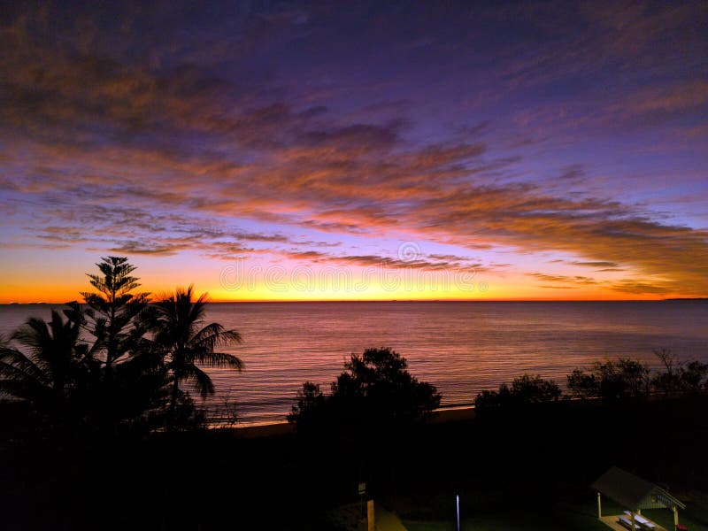 Beachscape at sunset stock image. Image of tracks, outcrop - 11339089