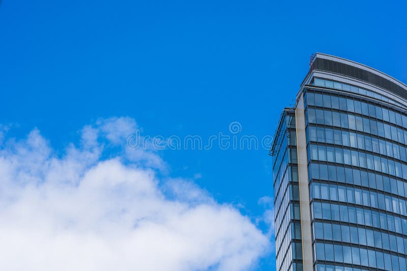 Stunning Blue Glass Building Against Blue Sky Stock Photo - Image of ...