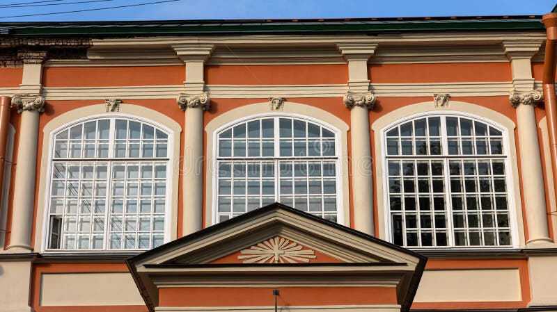 A Magnificent Building with Arched Windows and Elegant Columns Stock ...