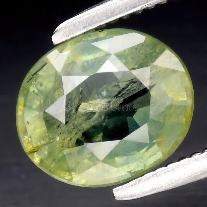 Stunning Close-Up of a Green Oval Sapphire Gemstone Captured with ...