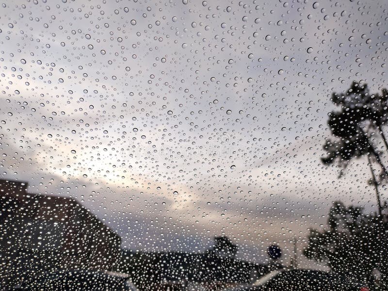 Stunning Closeup of Rain Droplets on a Window, Creating a Mesmerizing ...