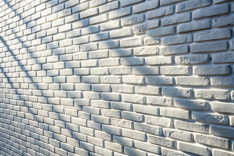 Stunning Diagonal Sunlight Highlights a Panoramic View of a White Brick ...