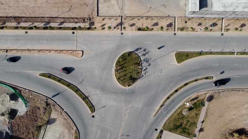 A Drone Video Shows the Roundabout with Traffic Flowing from Different ...