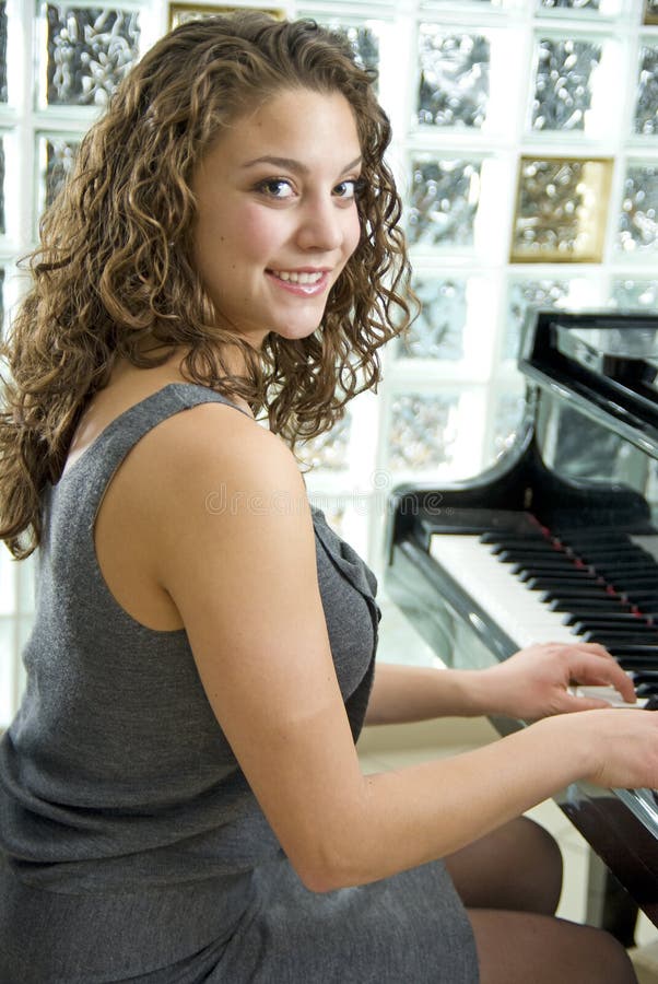 Stunning female pianist stock image. Image of board, lifestyle - 12749815