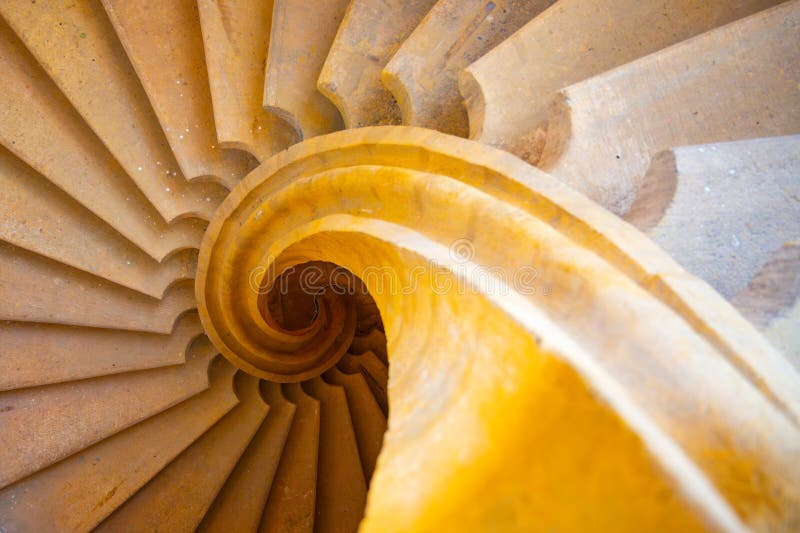 Yellow Spiral Staircase Descending Elegantly Stock Photo - Image of ...