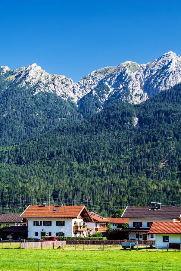 Stunning House Situated in Front of a Beautiful Mountain Backdrop Stock ...