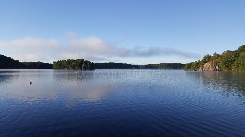 Stunning lake scene stock photo. Image of scenery, calm - 76610140
