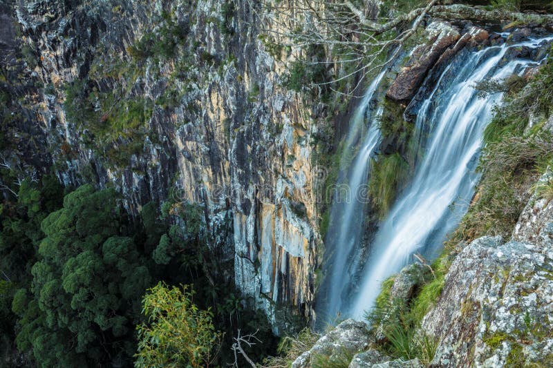 Stunning Landscape Featuring a Powerful Waterfall Cascading Down the ...