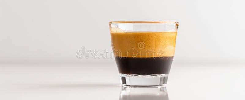The Stunning Layers of Espresso Artfully Presented in a Glass Cup AI ...