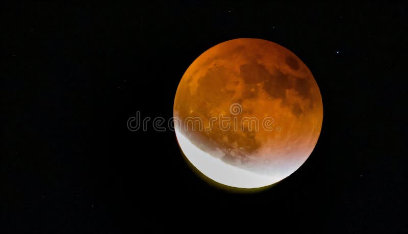 Lunar Eclipse with a Reddish Moon in the Night Sky. Stock Photo - Image ...