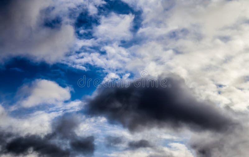 Stunning Mixed Cloud Formations on a Deep Blue Summer Sky Stock Photo ...