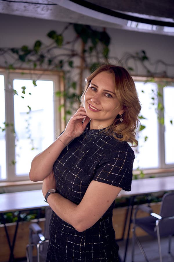 Stunning Model in Business Mini Dress Posing in Modern Office Space ...