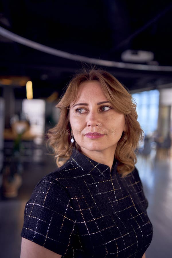 Stunning Model in Business Mini Dress Posing in Modern Office Space ...