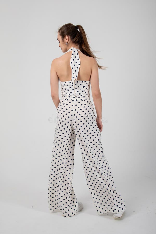 Stunning Model Posing in a White Polka Dot Set Stock Image - Image of ...
