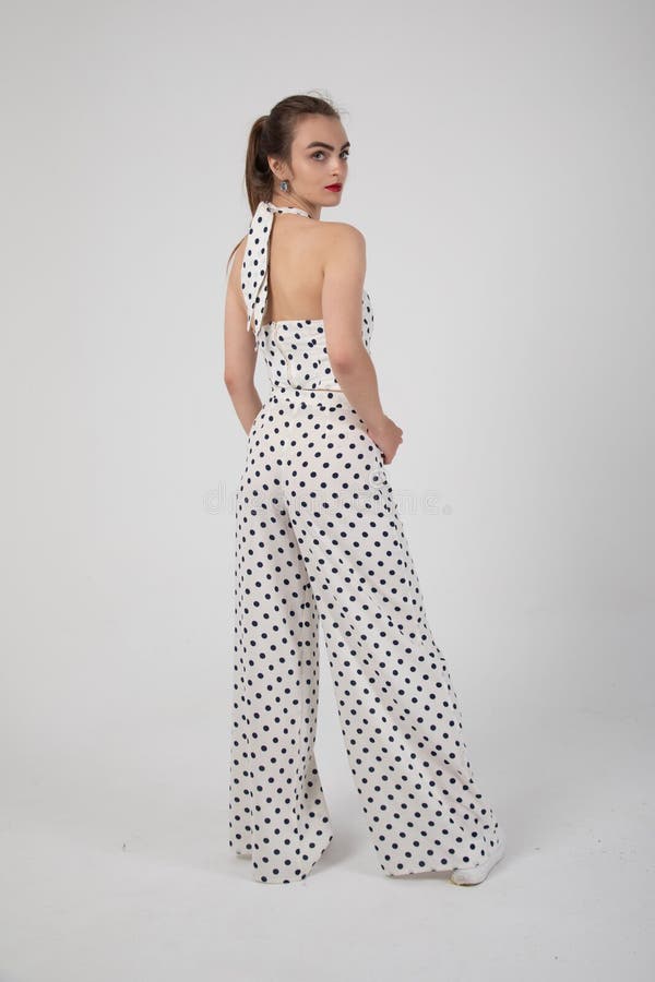 Stunning Model Posing in a White Polka Dot Set Stock Photo - Image of ...