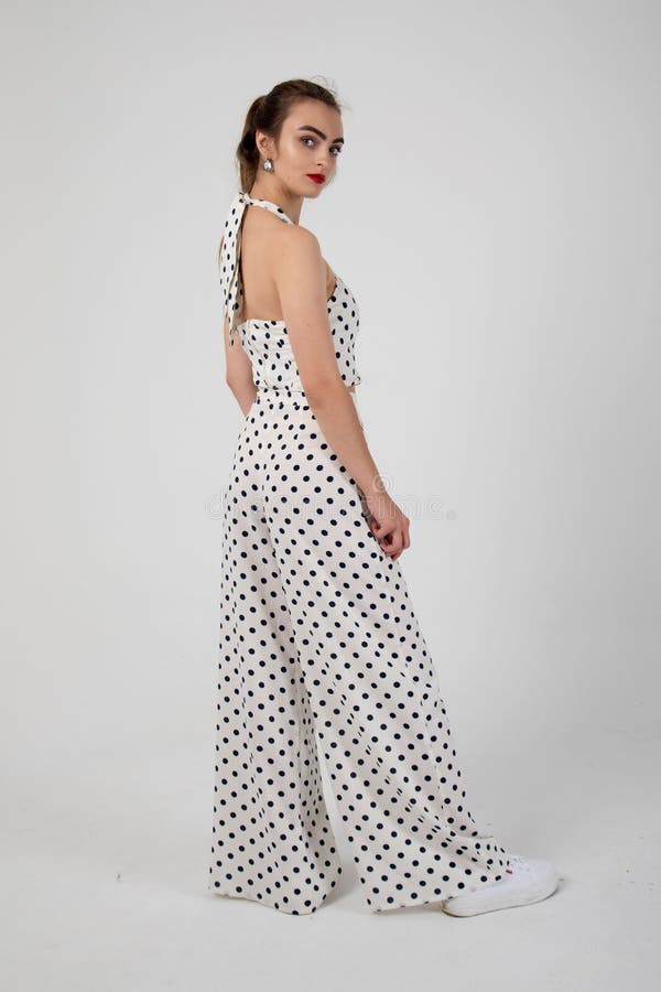 Stunning Model Posing in a White Polka Dot Set Stock Image - Image of ...