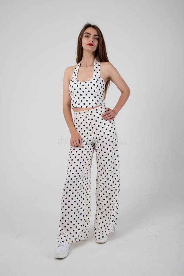 Stunning Model Posing in a White Polka Dot Set Stock Photo - Image of ...