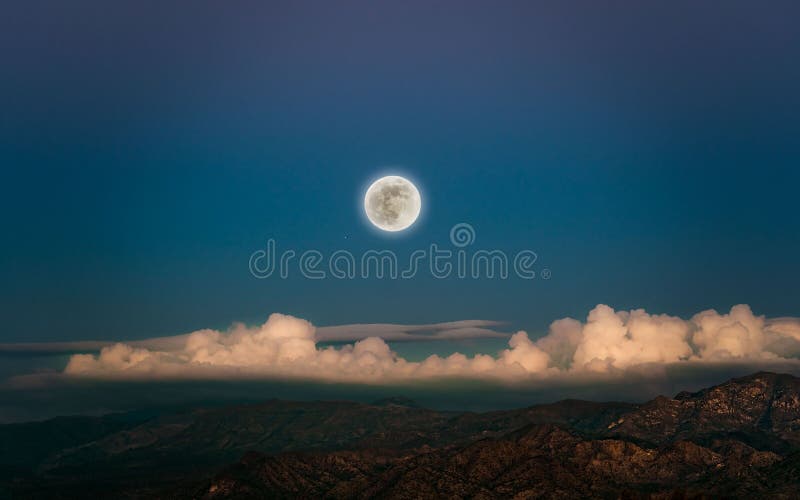 Stunning Nightscape Featuring an Illuminated Full Moon with Mars on the ...
