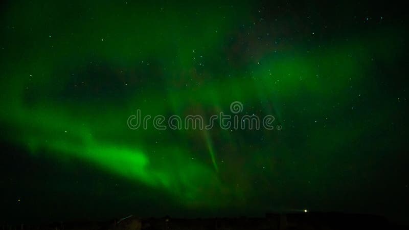 Stunning Nighttime View of a Sky Illuminated with an Ethereal Green ...